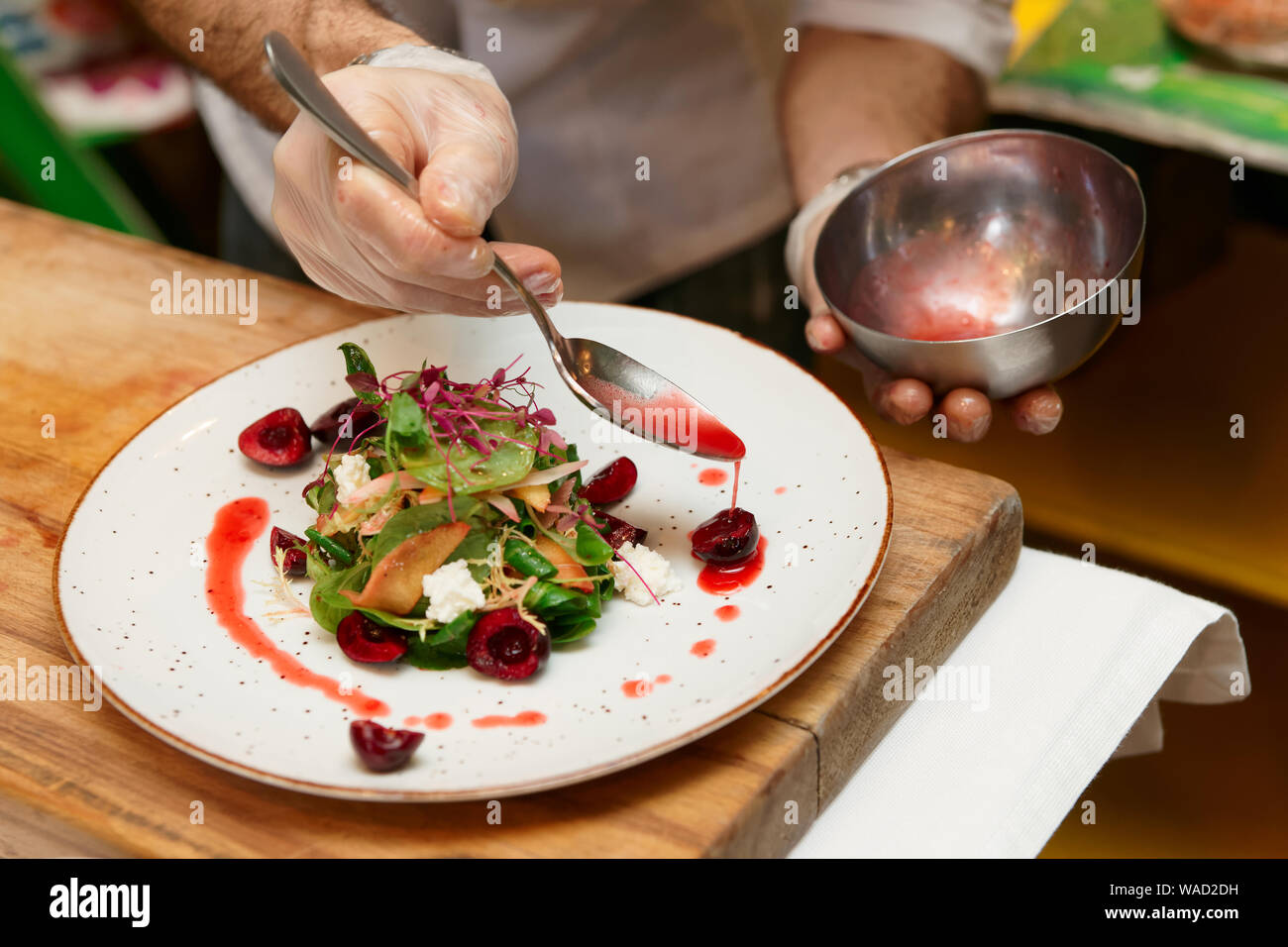 Adding the sauce hi-res stock photography and images - Alamy