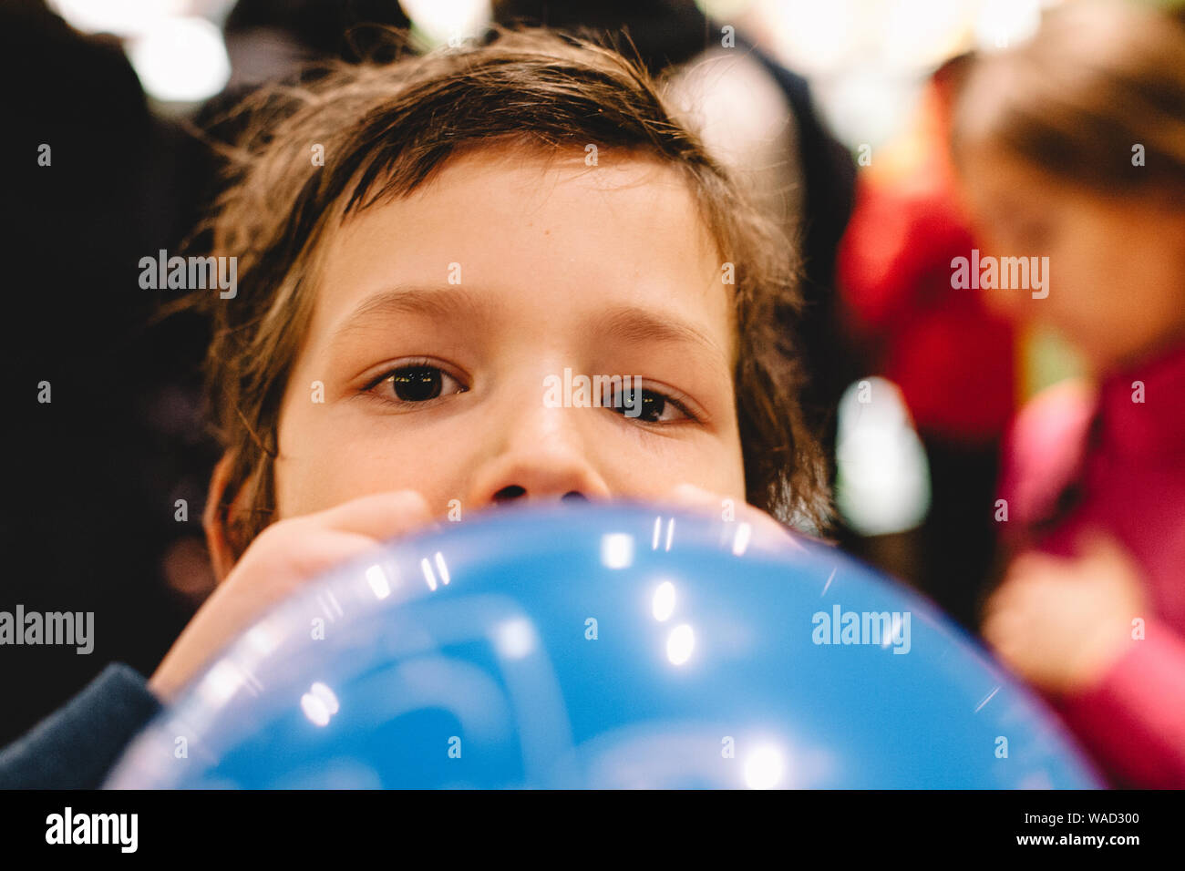Blowing balloon for kid hi-res stock photography and images - Alamy