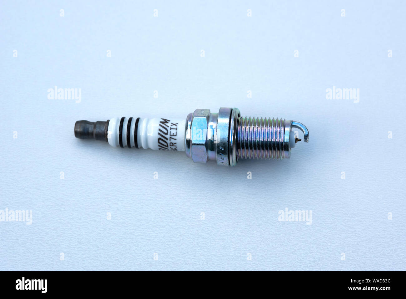 A single new spark plug for a modern petrol combustion engine Stock ...