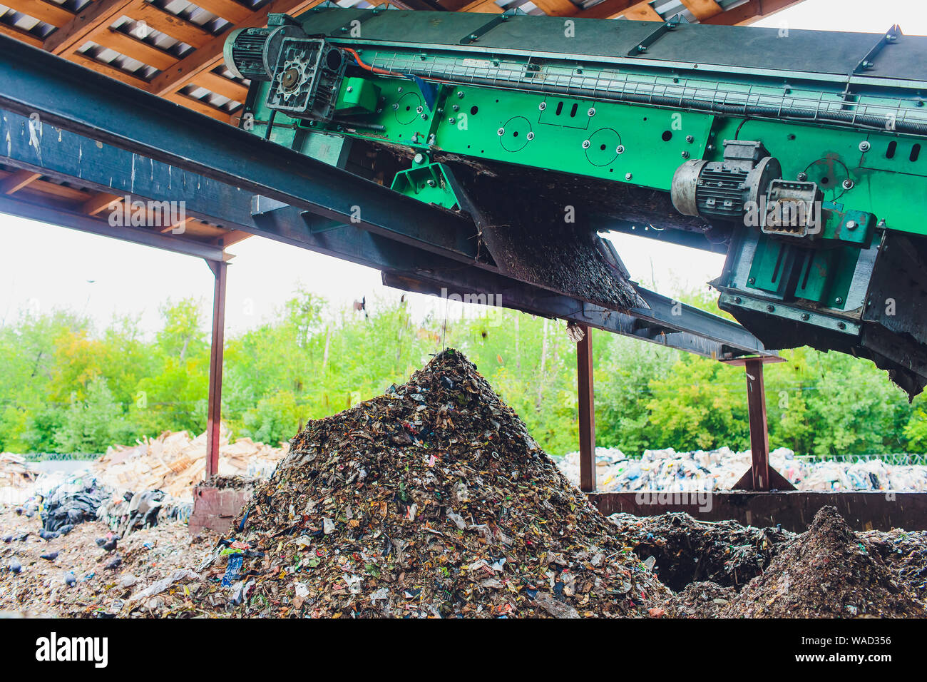 moving conveyor transporter on Modern waste recycling processing plant ...
