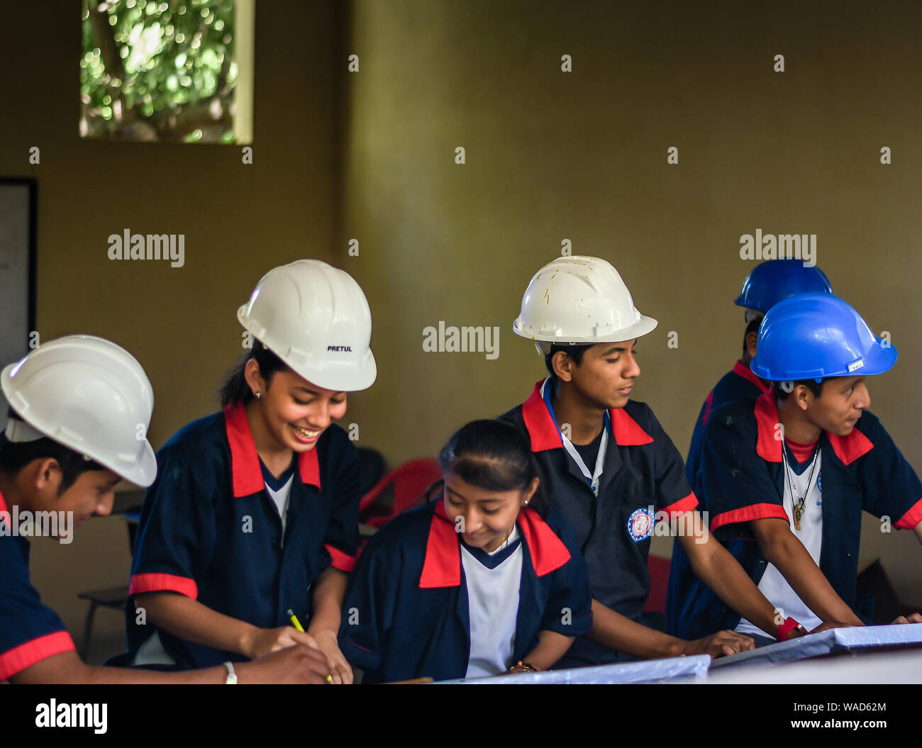 male and female students working on project in Guatemalan school Stock ...