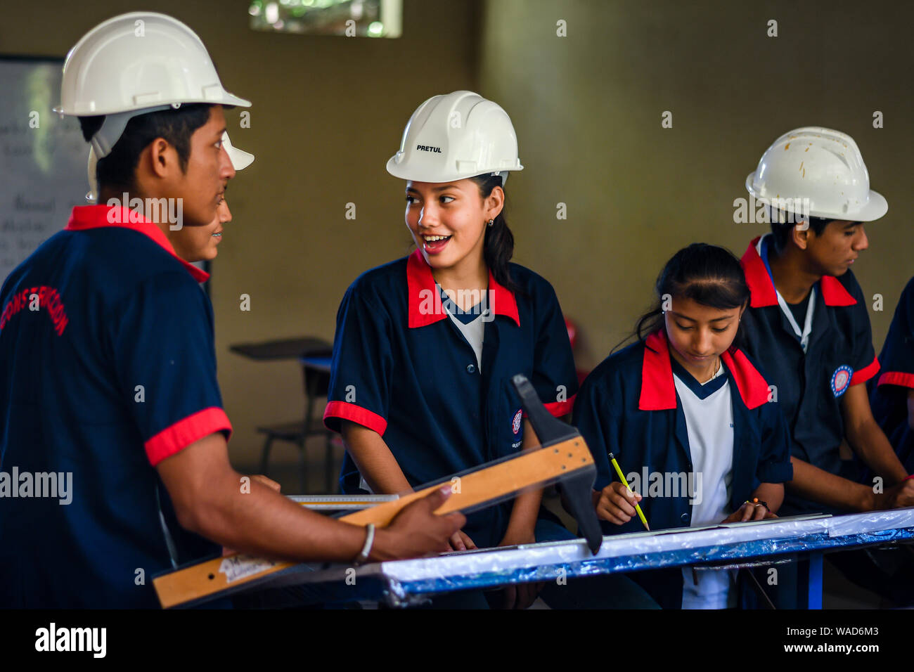 male and female students working on project in Guatemalan school Stock ...