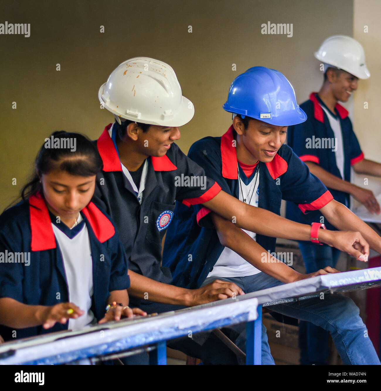 latin students doing project at college in Guatemala Stock Photo - Alamy