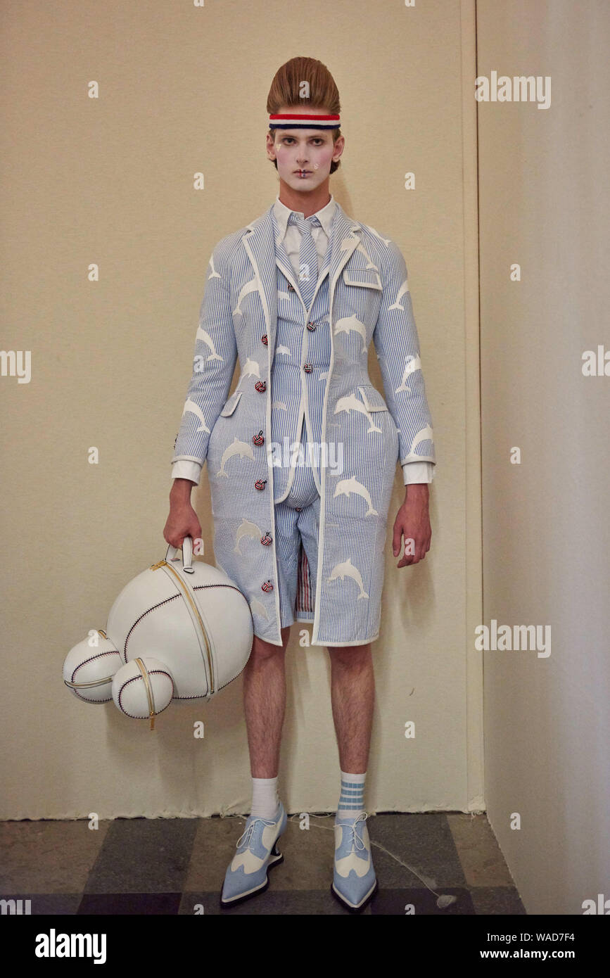 Models are pictured backstage after finishing hair and makeup at the ...