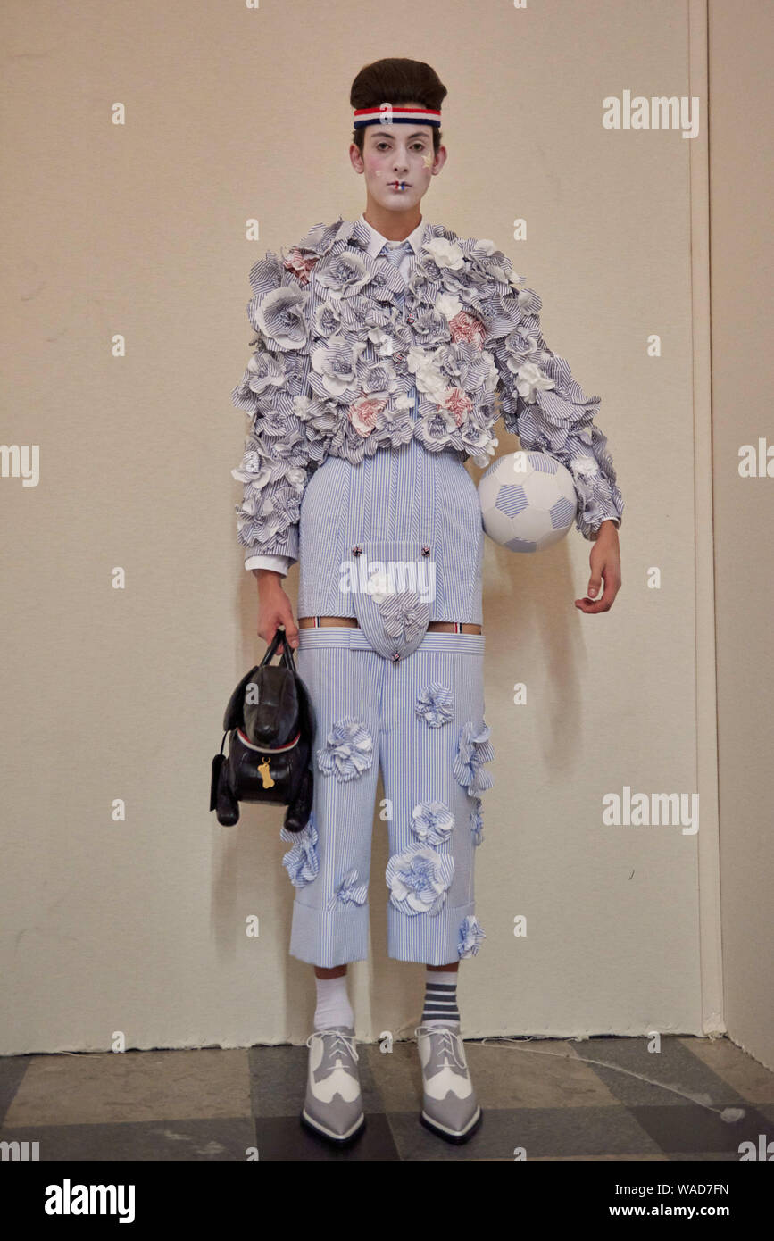 Models are pictured backstage after finishing hair and makeup at the ...