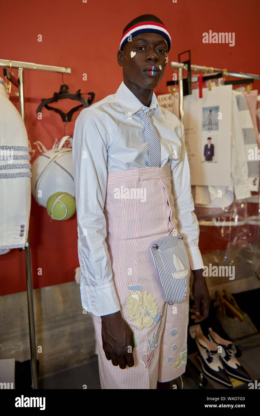 Models are pictured backstage after finishing hair and makeup at the ...