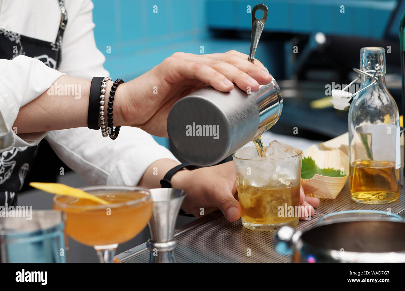 Pouring cocktail from shaker into hi-res stock photography and images ...