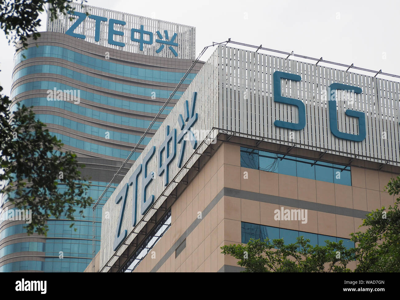 --FILE--Logos of ZTE and 5G are seen on the rooftop of the headquarters ...