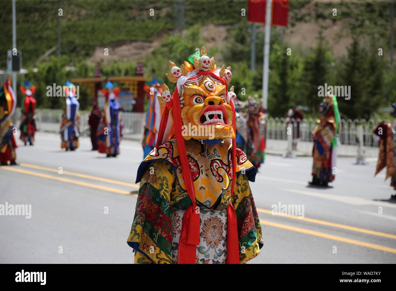 An entertainer dressed in Kangba costumes, one branch of the Tibetan ...