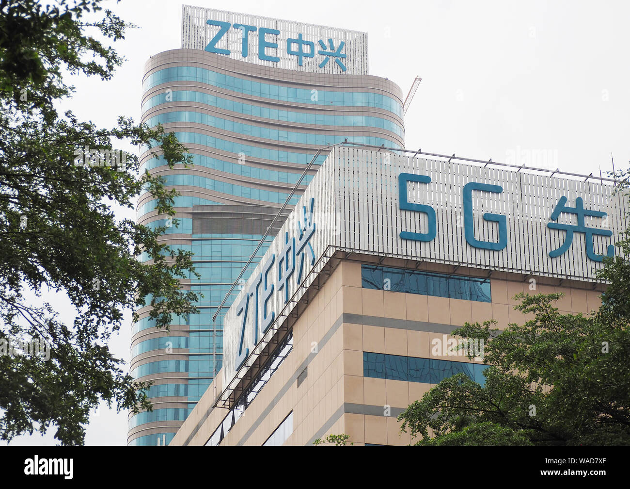 --FILE--Logos of ZTE and 5G are seen on the rooftop of the headquarters ...