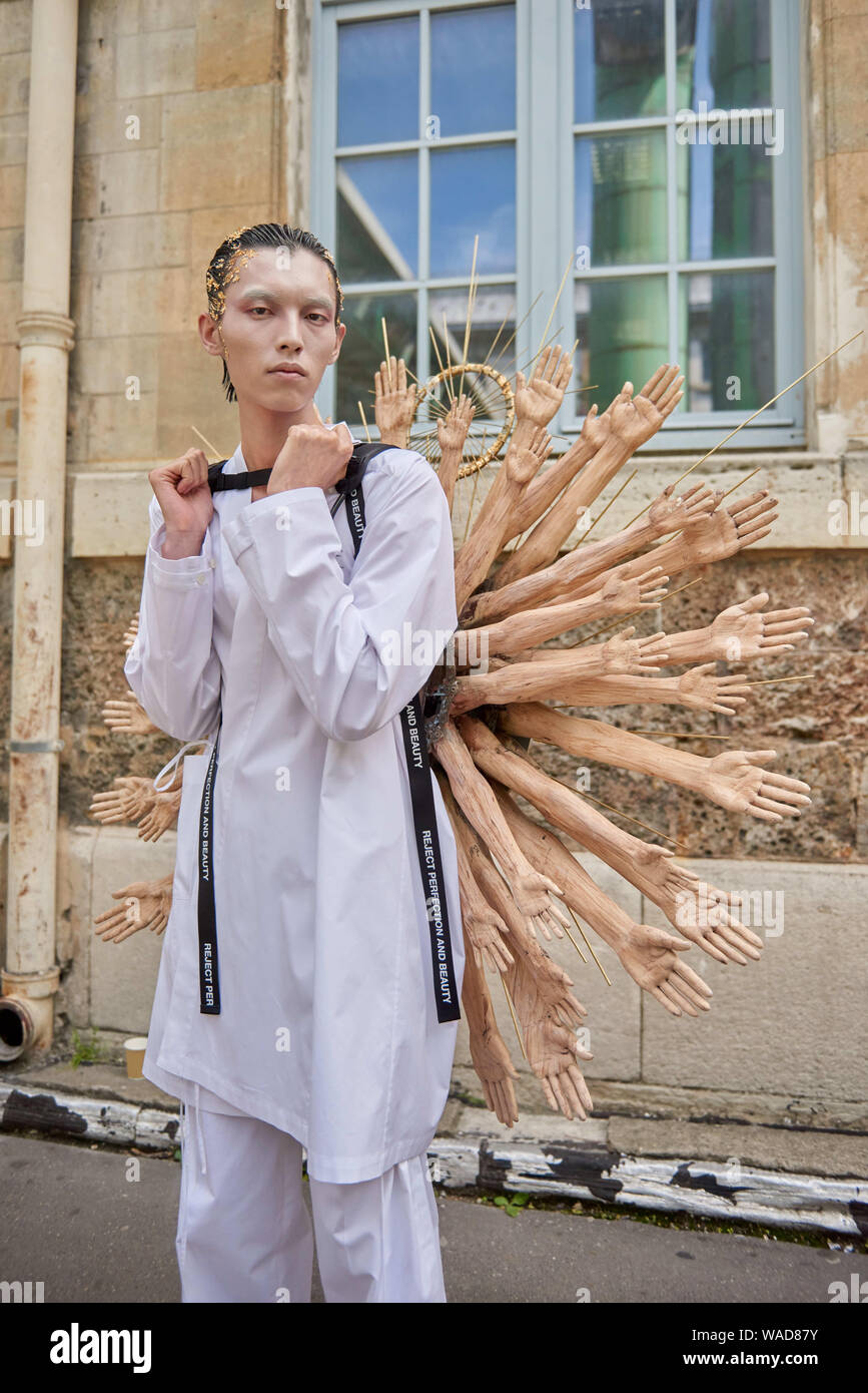Models are pictured backstage after finishing hair and makeup at the ...