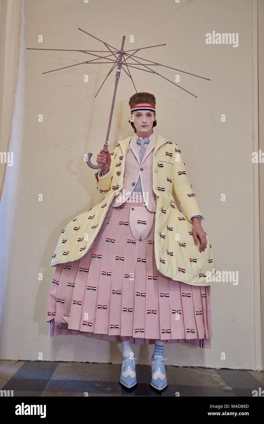 Models are pictured backstage after finishing hair and makeup at the ...