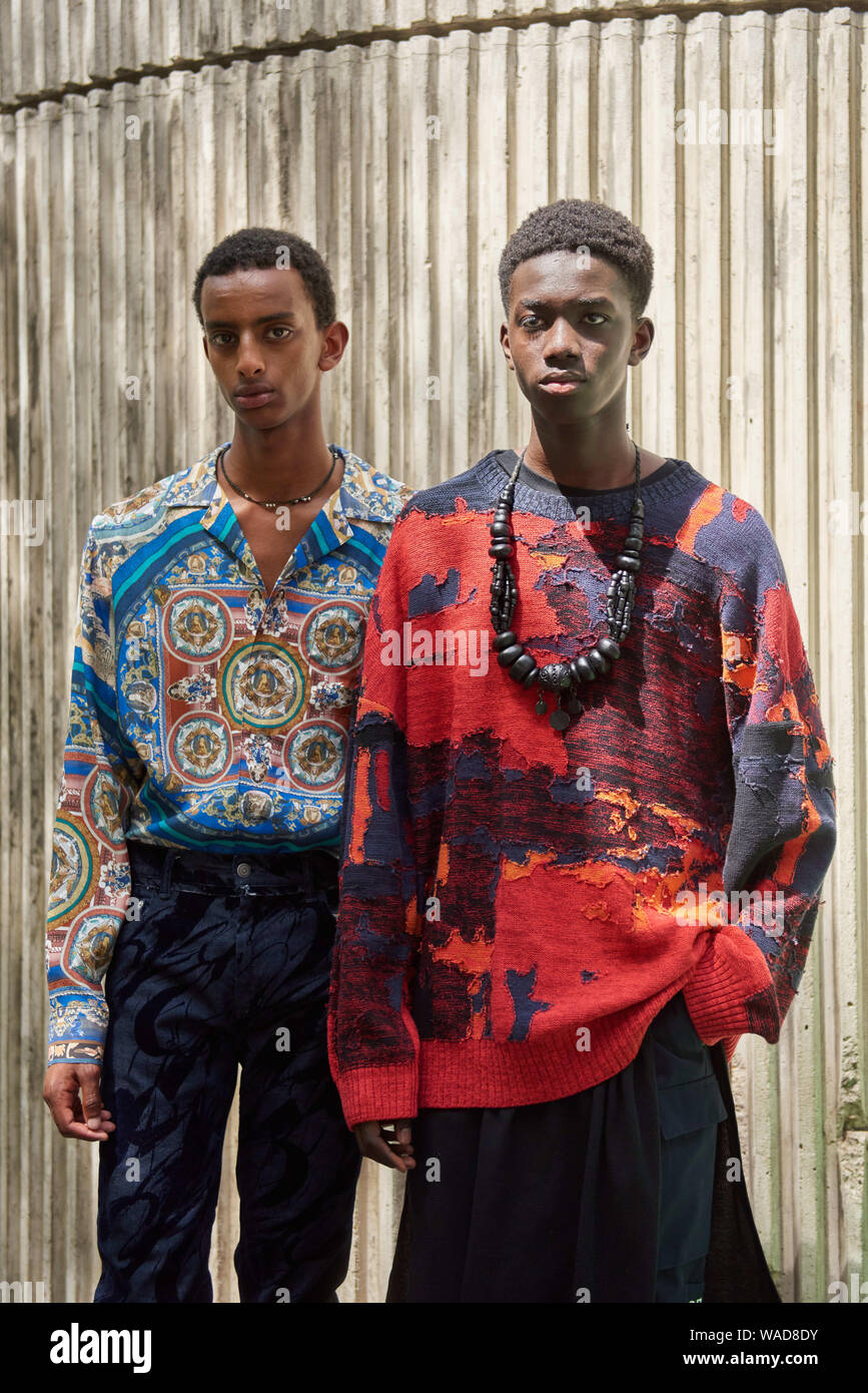 Models are pictured backstage after finishing hair and makeup at the ...