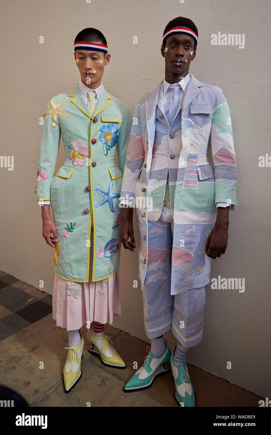Models are pictured backstage after finishing hair and makeup at the ...