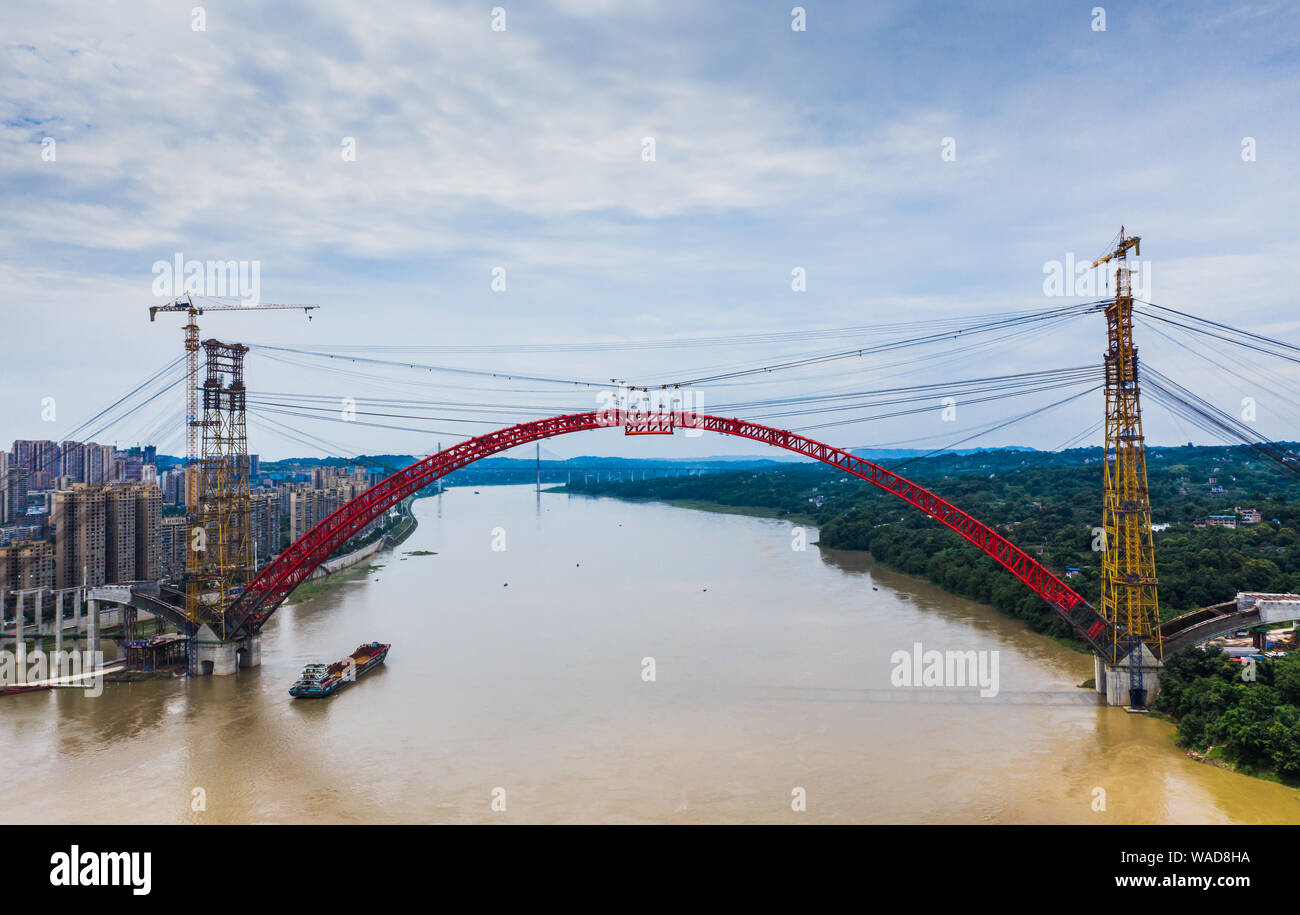 In this aerial view, the closure of main arch of Hejiang Yangtze River ...