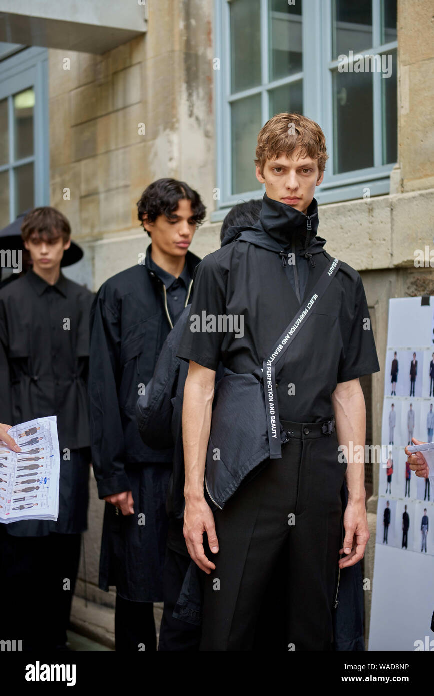 Models are pictured backstage after finishing hair and makeup at the ...