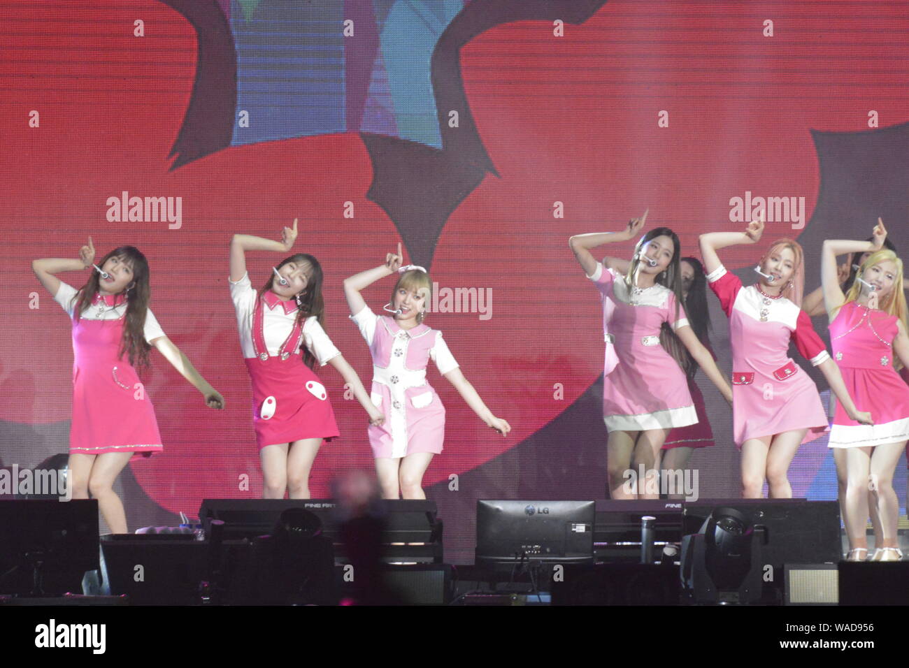 Members of South Korean girl group Izone, stylized as IZ*ONE, perform ...