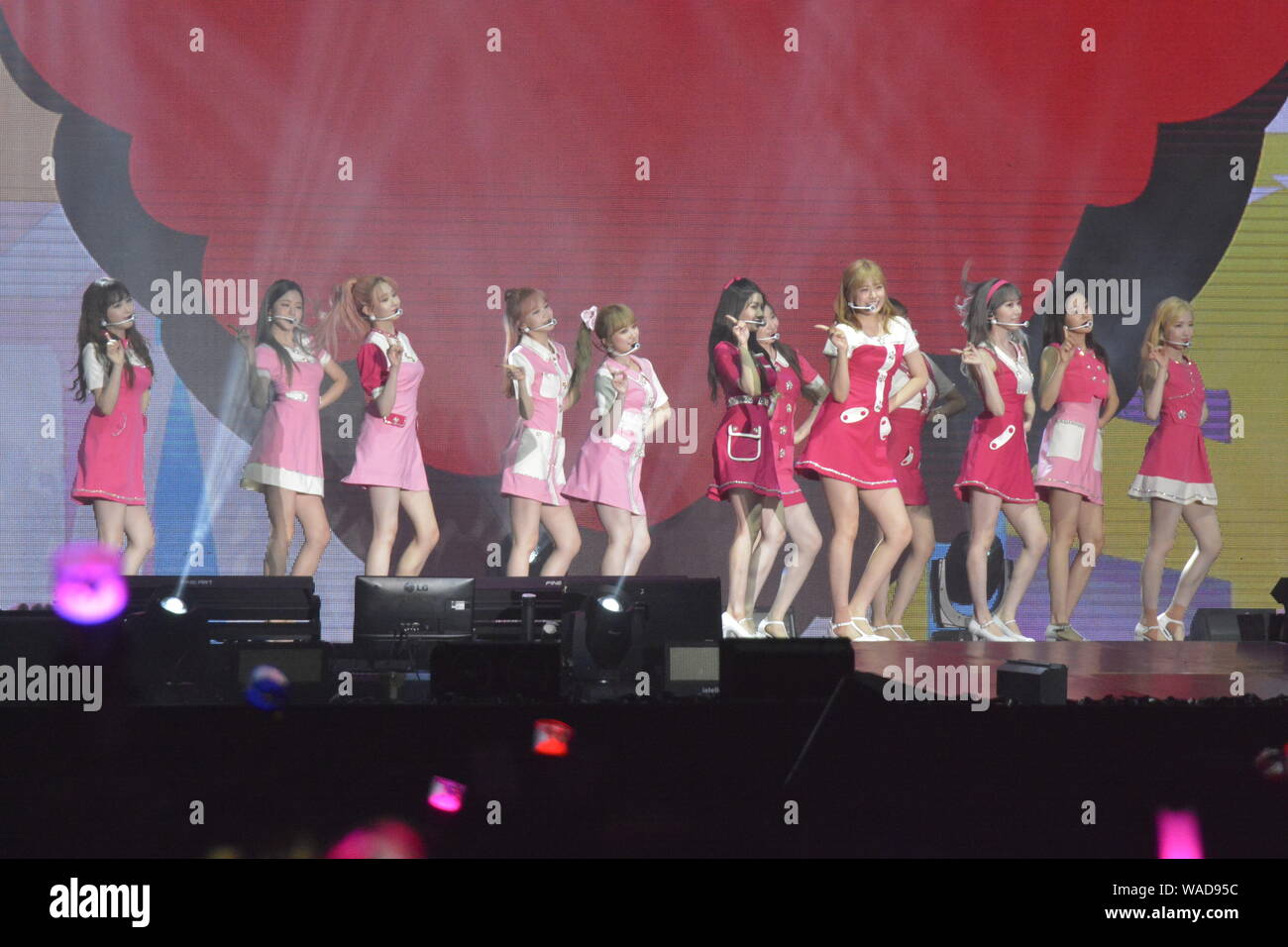 Members of South Korean girl group Izone, stylized as IZ*ONE, perform ...