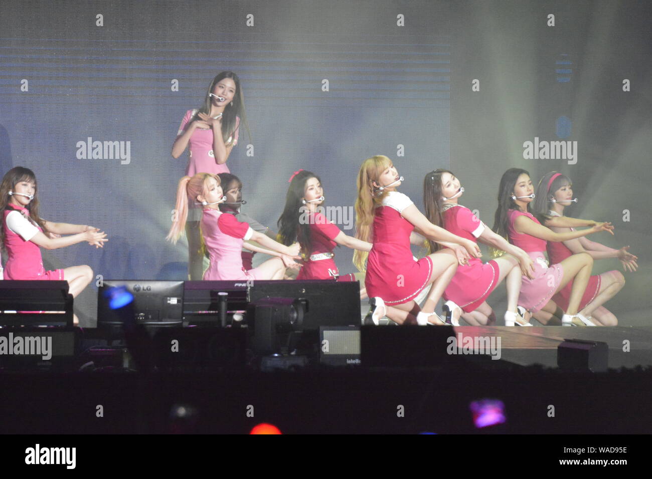 Members of South Korean girl group Izone, stylized as IZ*ONE, perform ...