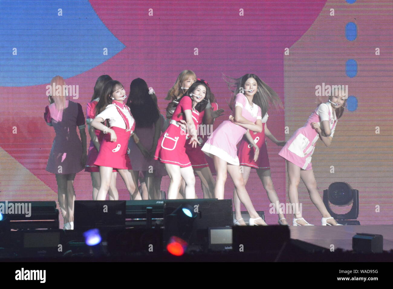 Members of South Korean girl group Izone, stylized as IZ*ONE, perform ...