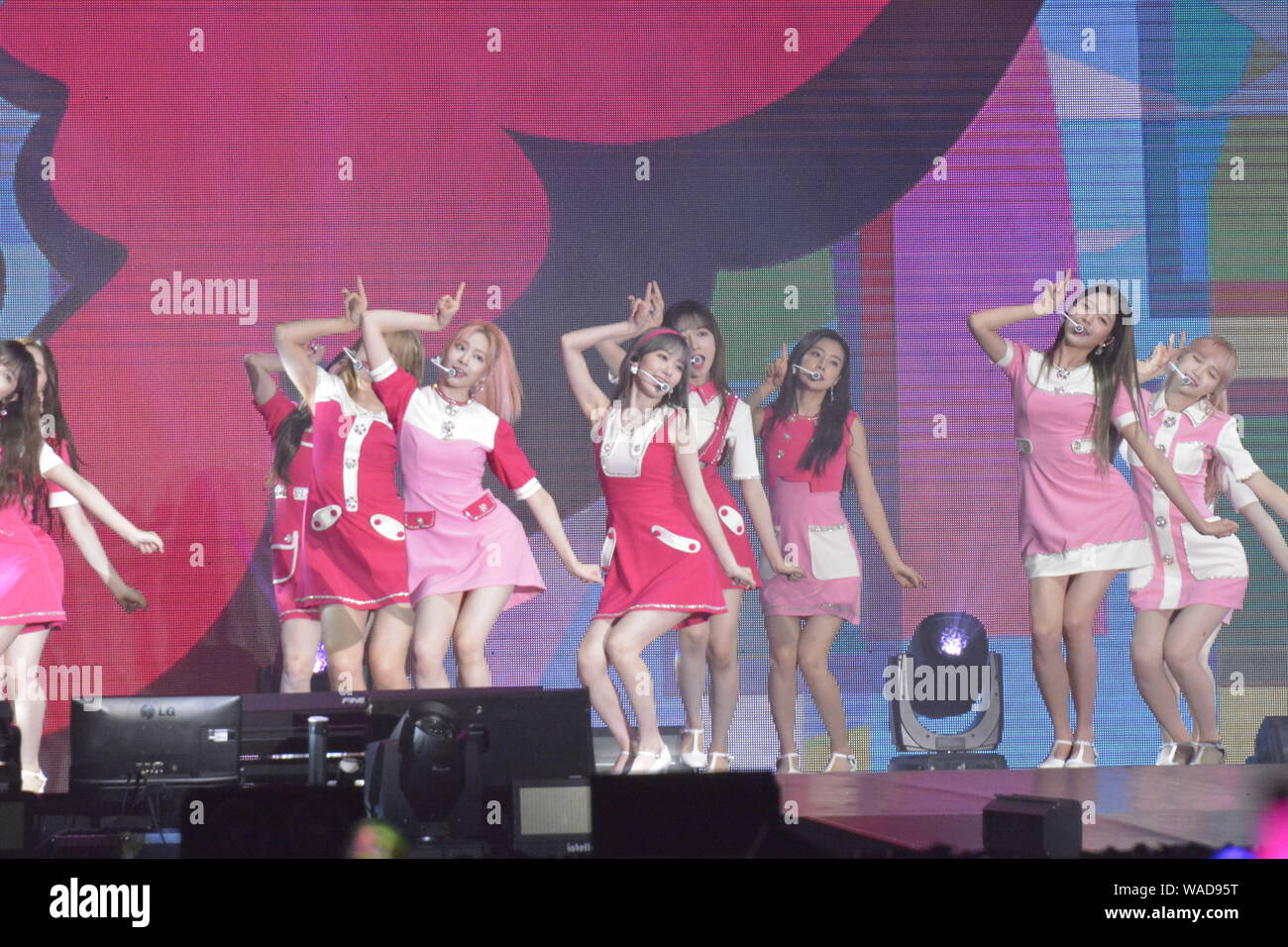 Members of South Korean girl group Izone, stylized as IZ*ONE, perform ...