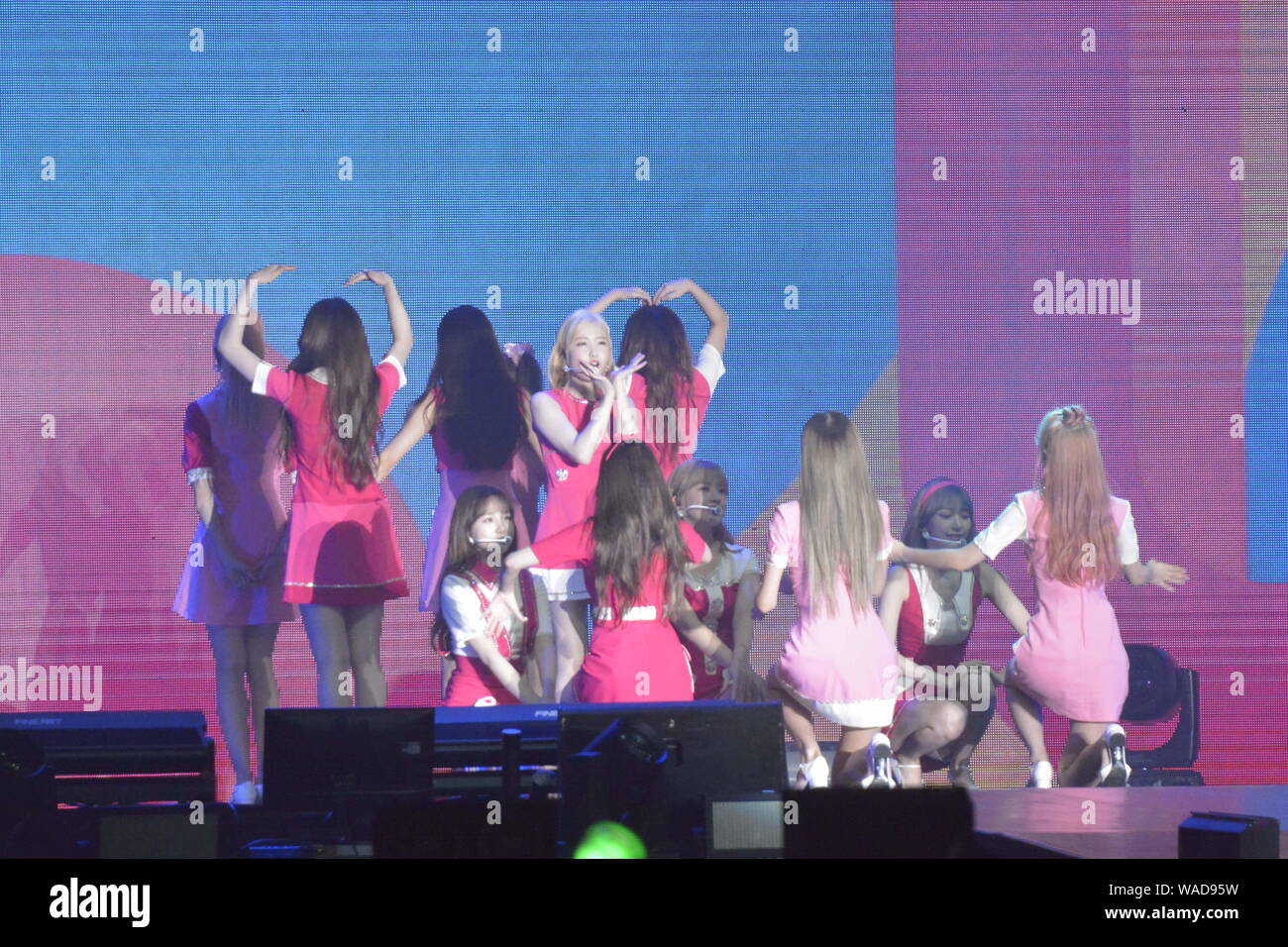 Members of South Korean girl group Izone, stylized as IZ*ONE, perform ...