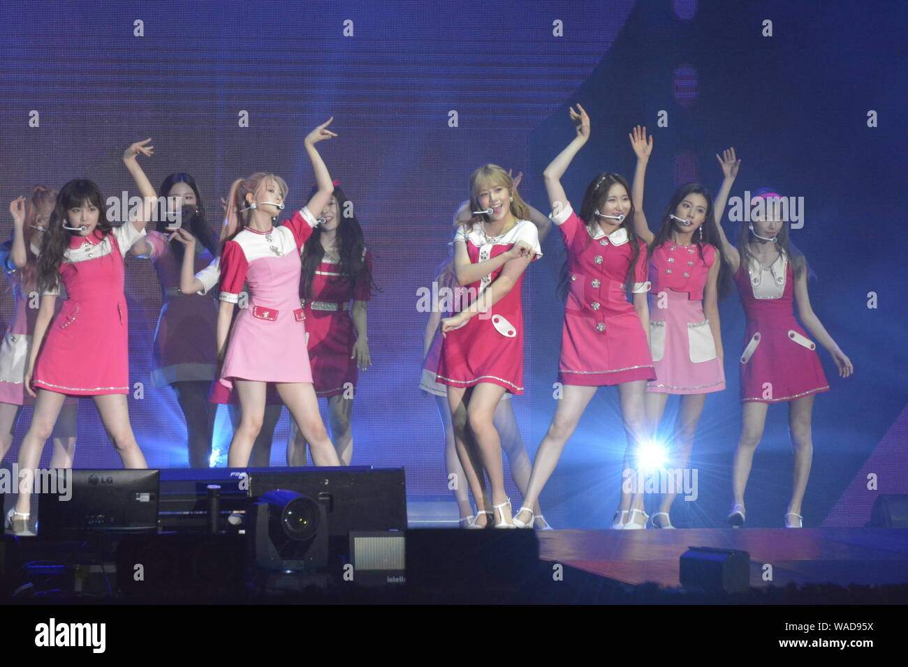 Members of South Korean girl group Izone, stylized as IZ*ONE, perform ...