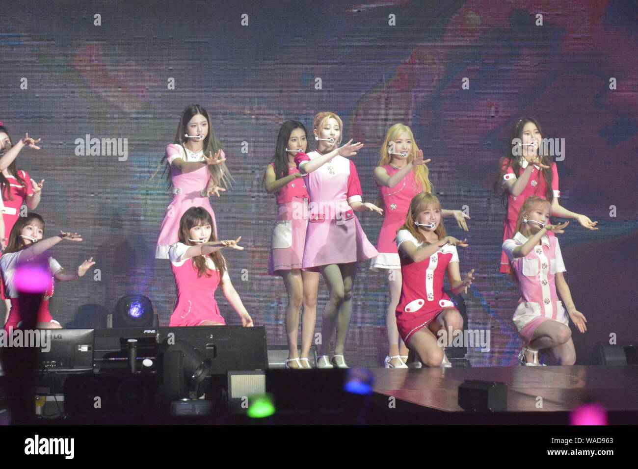 Members of South Korean girl group Izone, stylized as IZ*ONE, perform ...