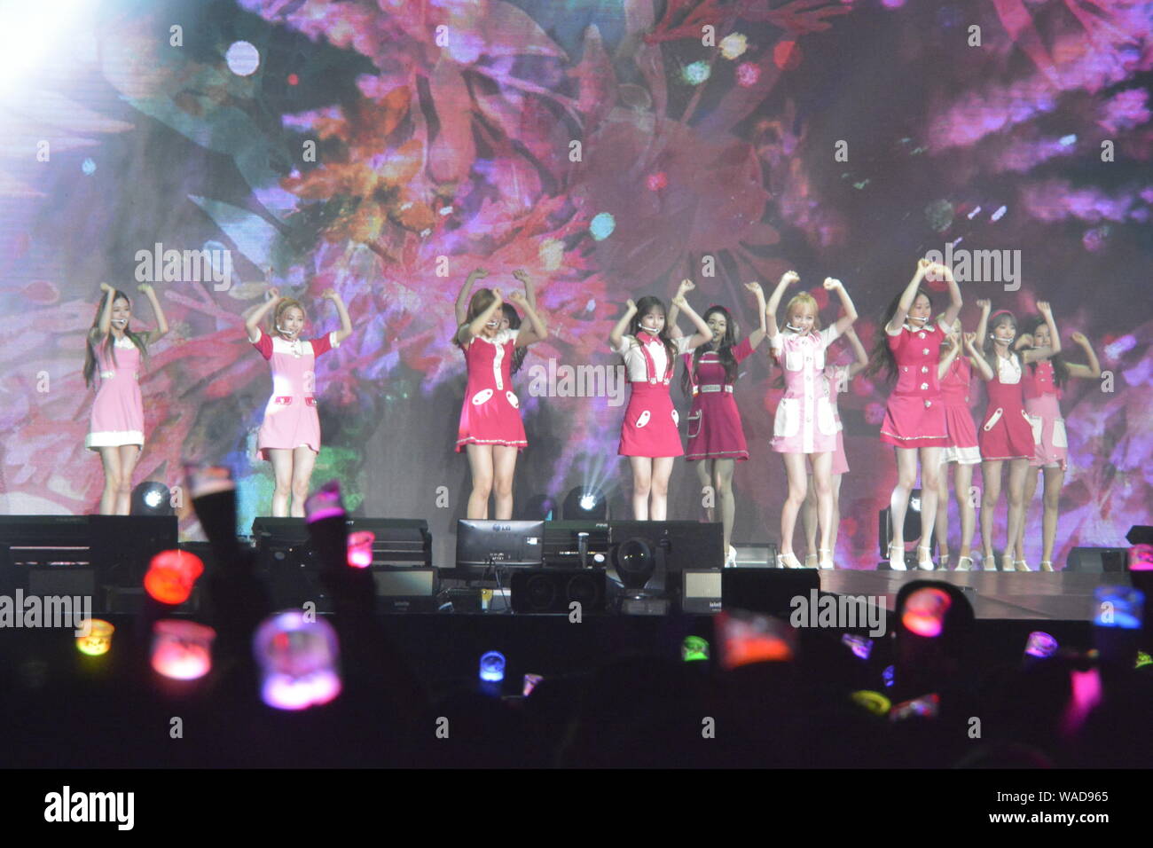 Members of South Korean girl group Izone, stylized as IZ*ONE, perform ...