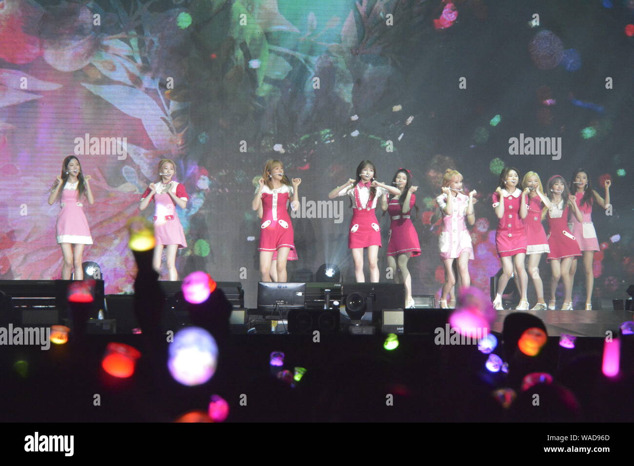 Members of South Korean girl group Izone, stylized as IZ*ONE, perform ...