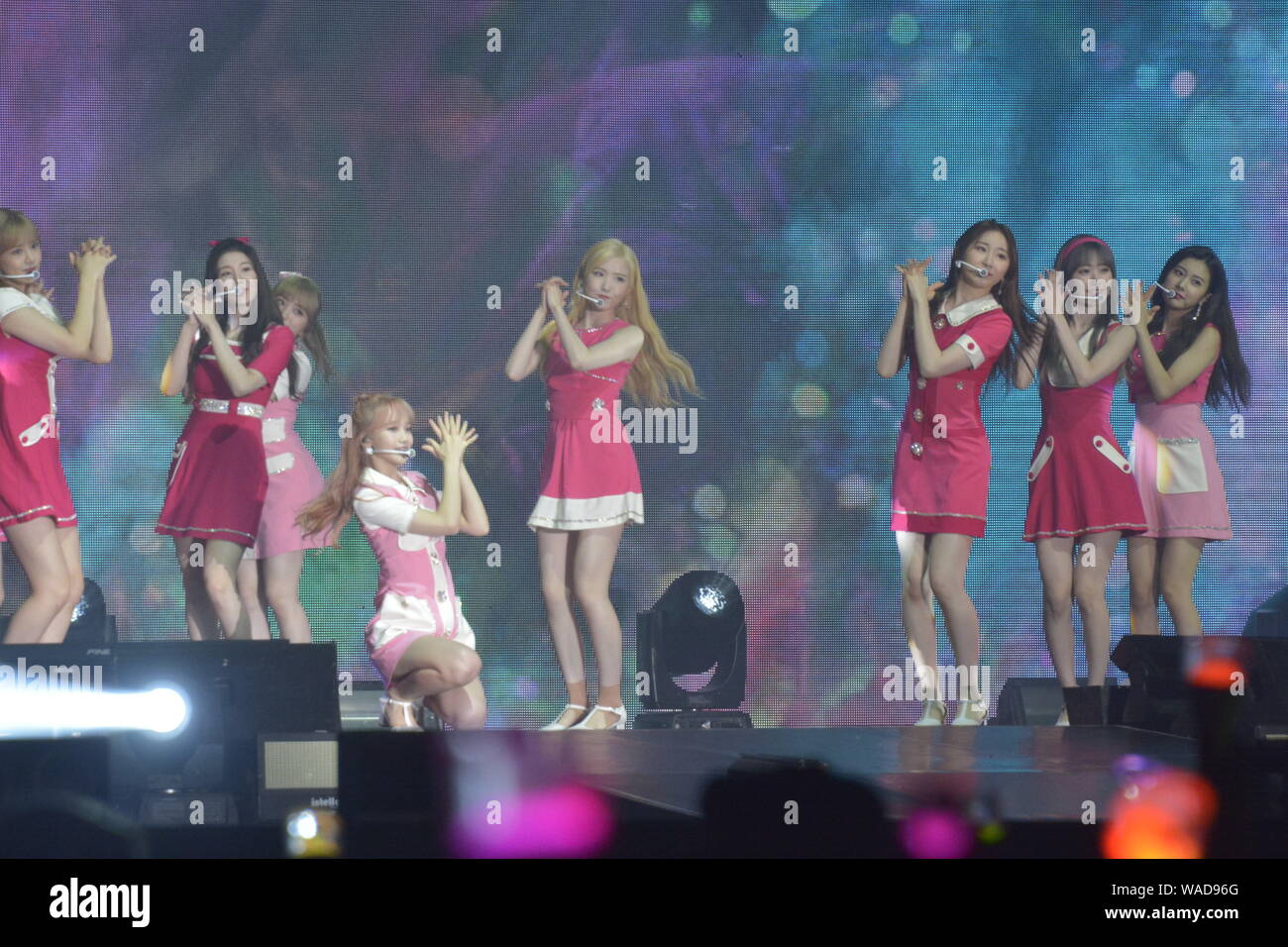 Members of South Korean girl group Izone, stylized as IZ*ONE, perform ...