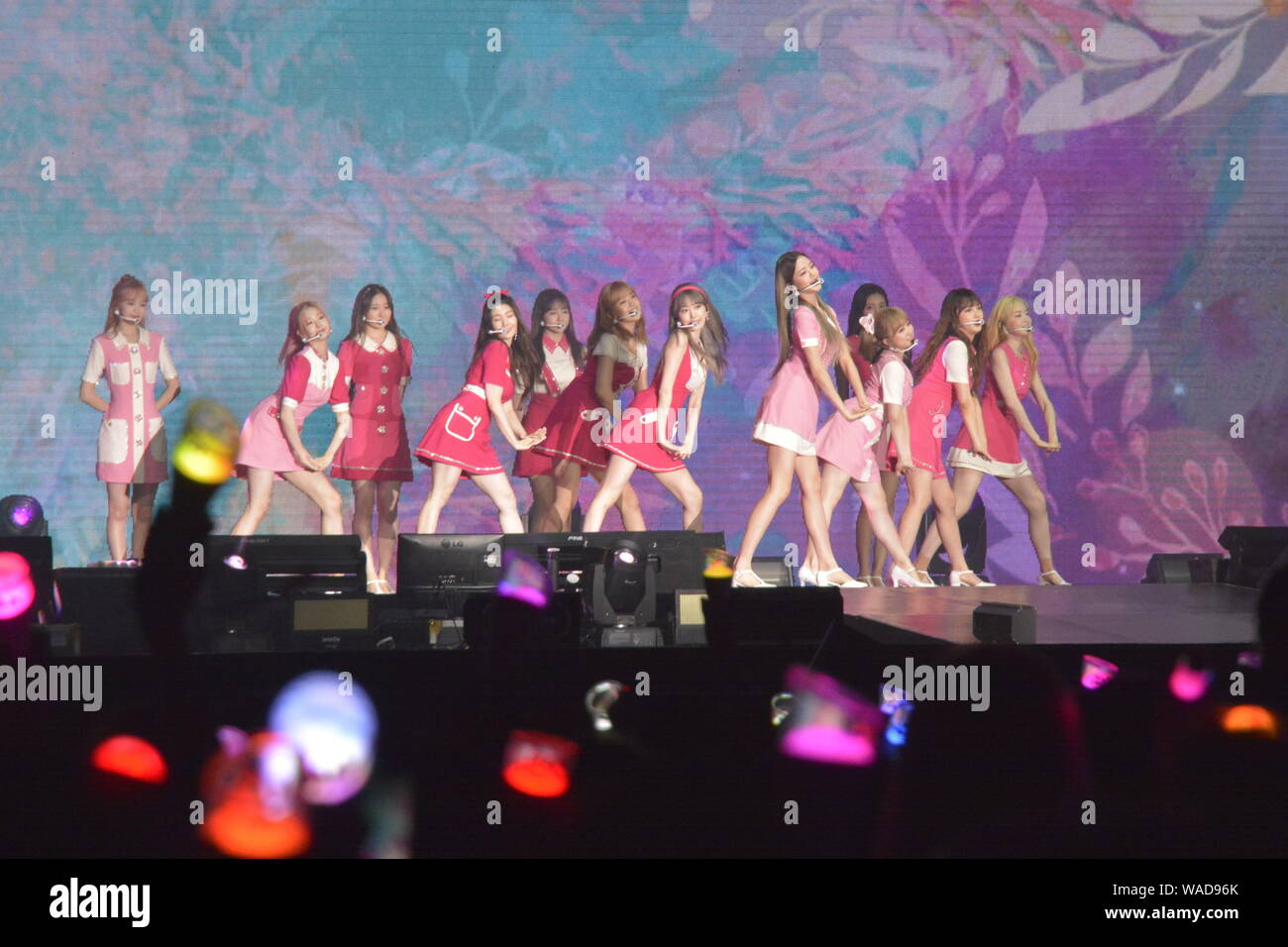 Members of South Korean girl group Izone, stylized as IZ*ONE, perform ...