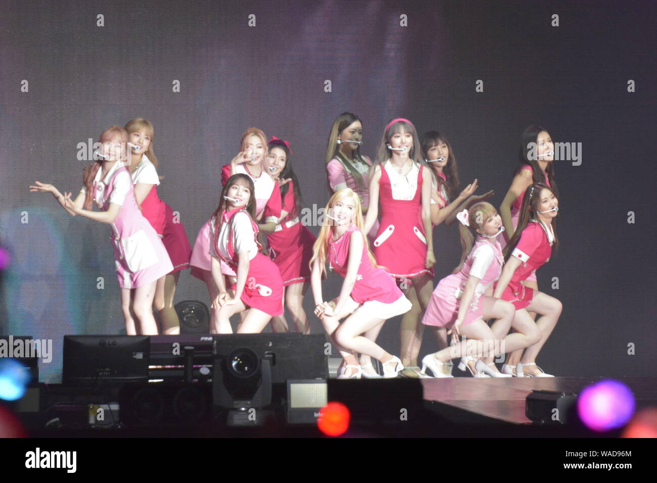 Members of South Korean girl group Izone, stylized as IZ*ONE, perform ...