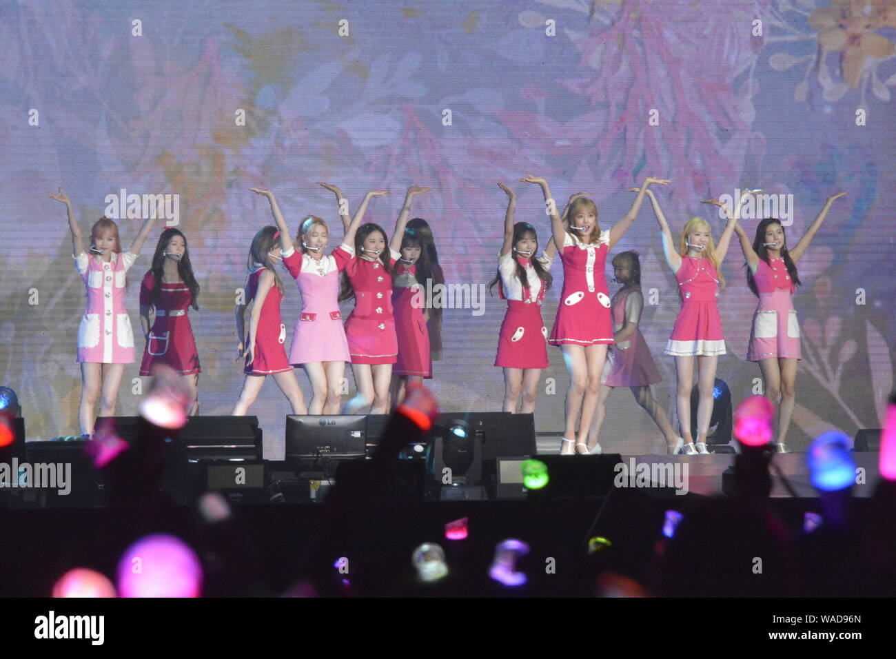 Members of South Korean girl group Izone, stylized as IZ*ONE, perform ...