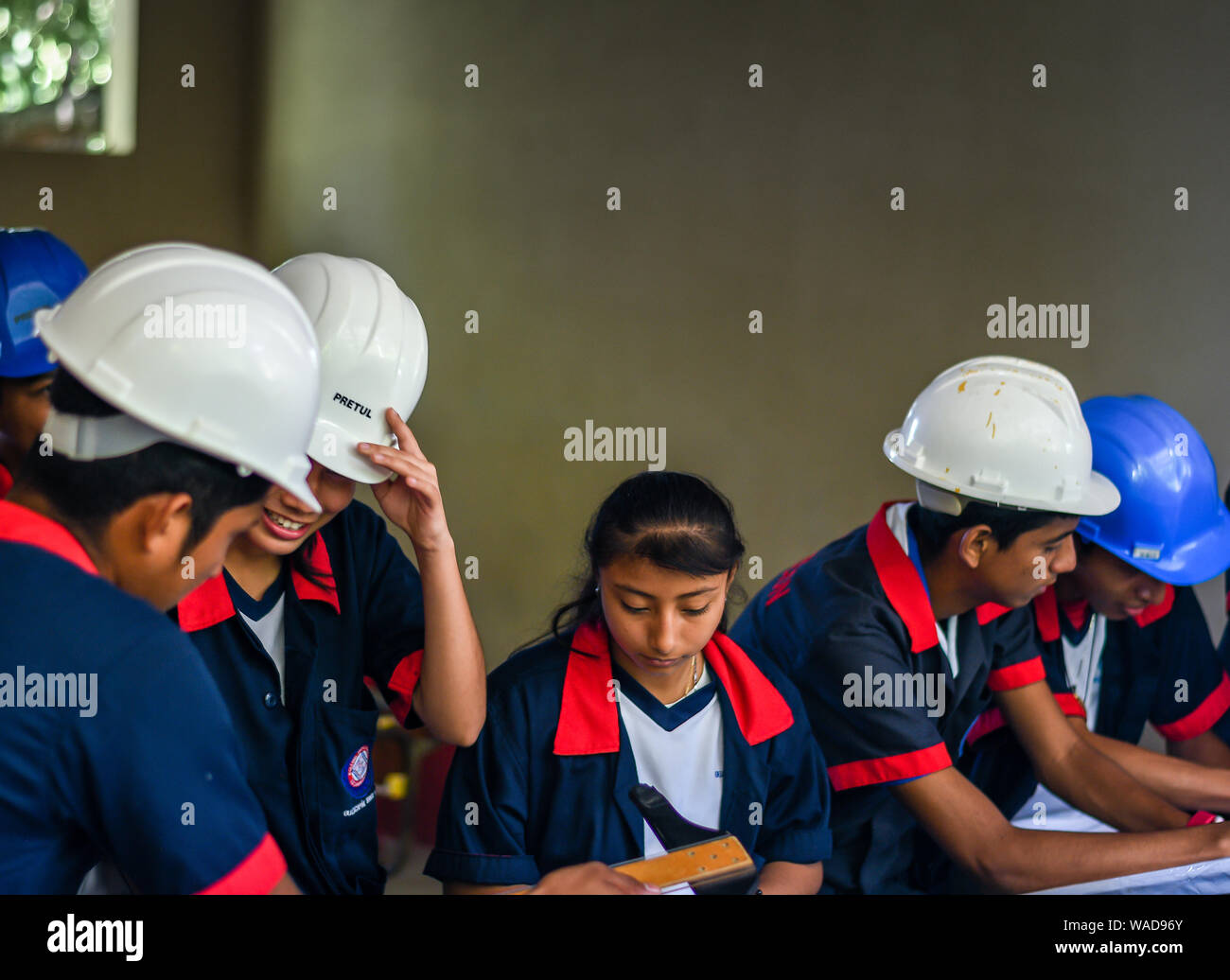 male and female students working on project in Guatemalan school Stock ...
