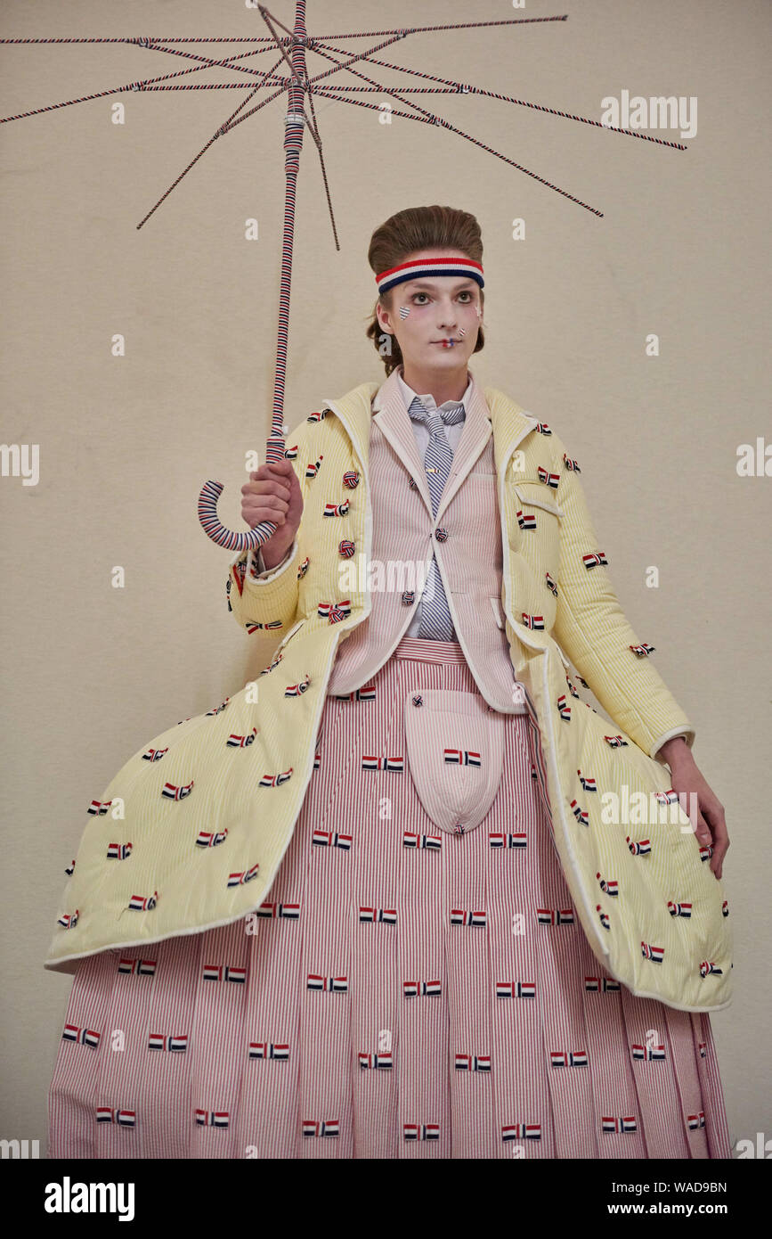 Models are pictured backstage after finishing hair and makeup at the ...