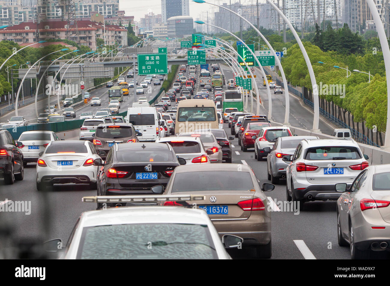 --FILE--Cars move slowly on a road in a traffic jam during rush hours ...