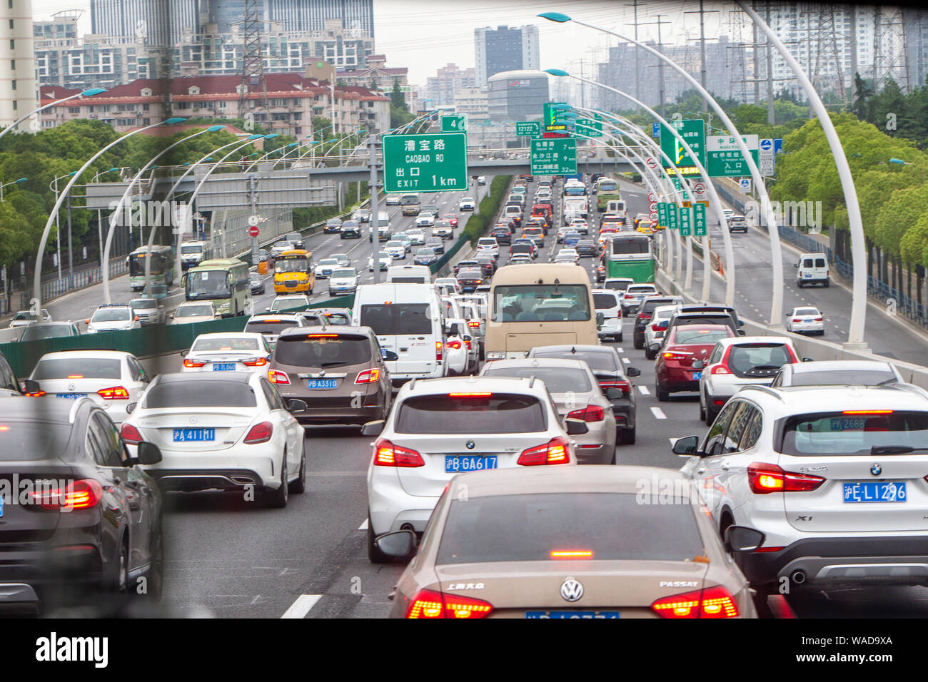 --FILE--Cars move slowly on a road in a traffic jam during rush hours ...