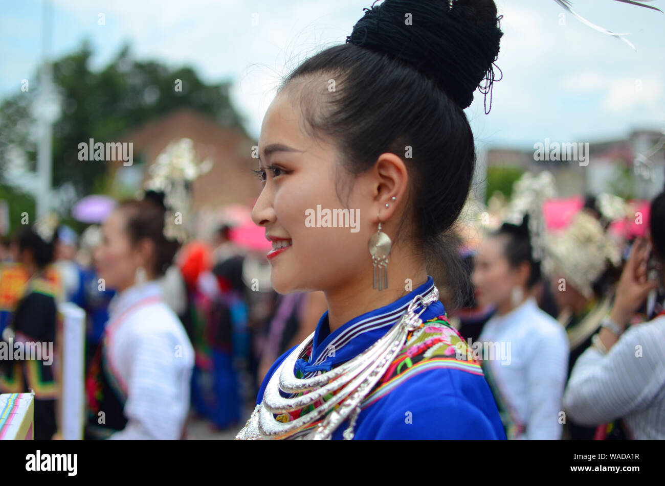 Chinese people of Dong ethnic group dressed in traditional costumes ...