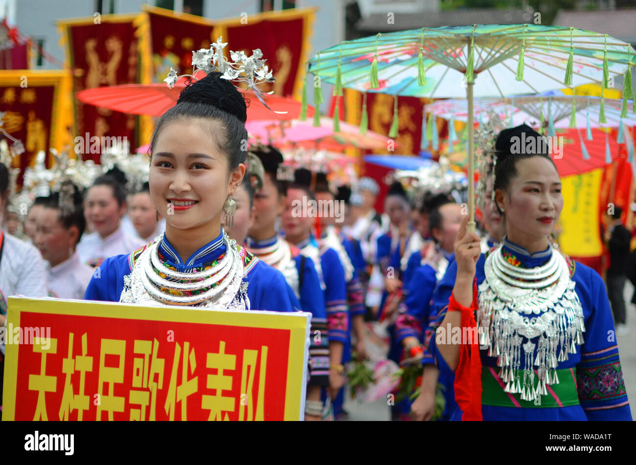 Chinese people of Dong ethnic group dressed in traditional costumes ...