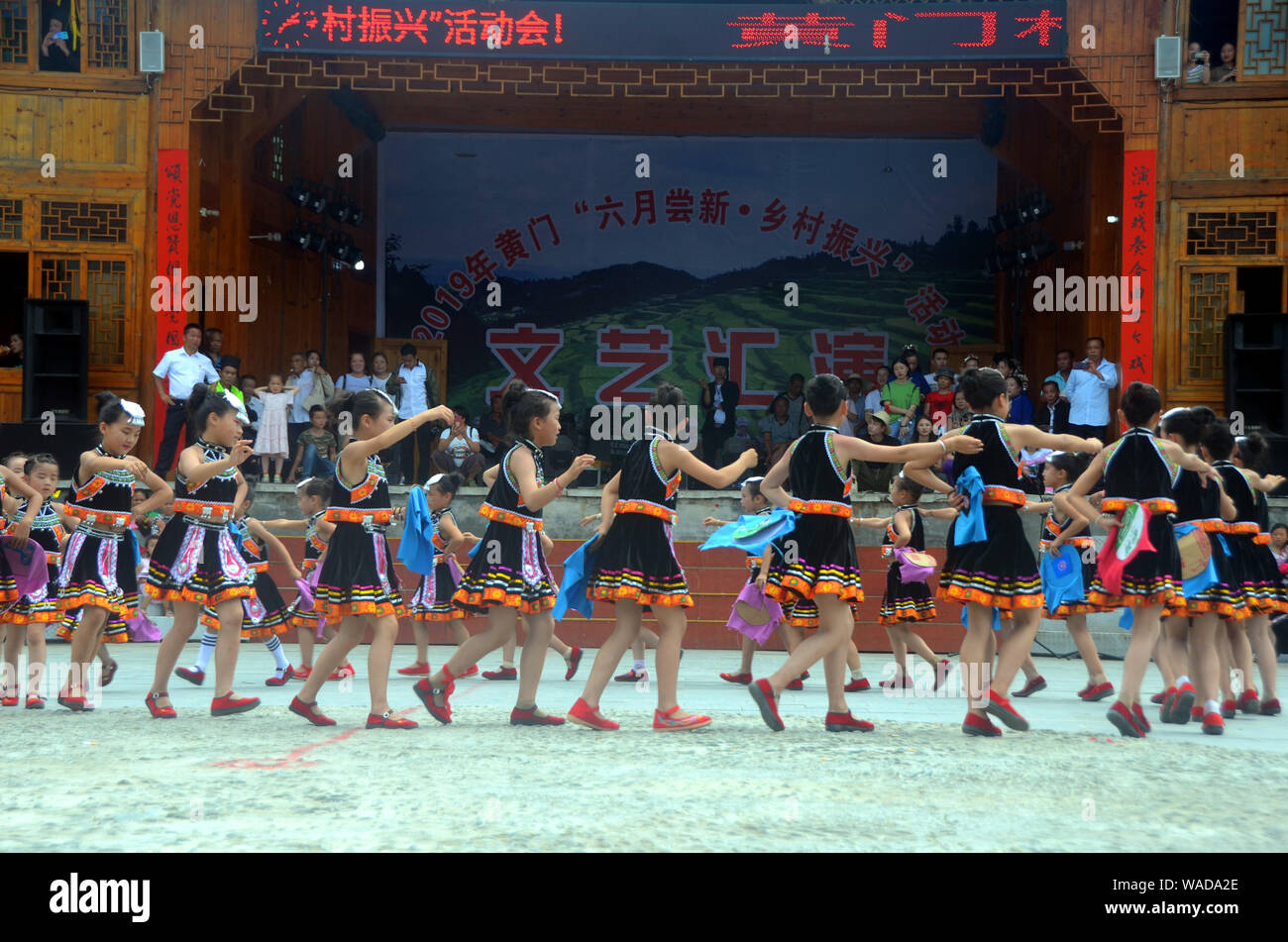 Chinese people of Dong ethnic group dressed in traditional costumes ...