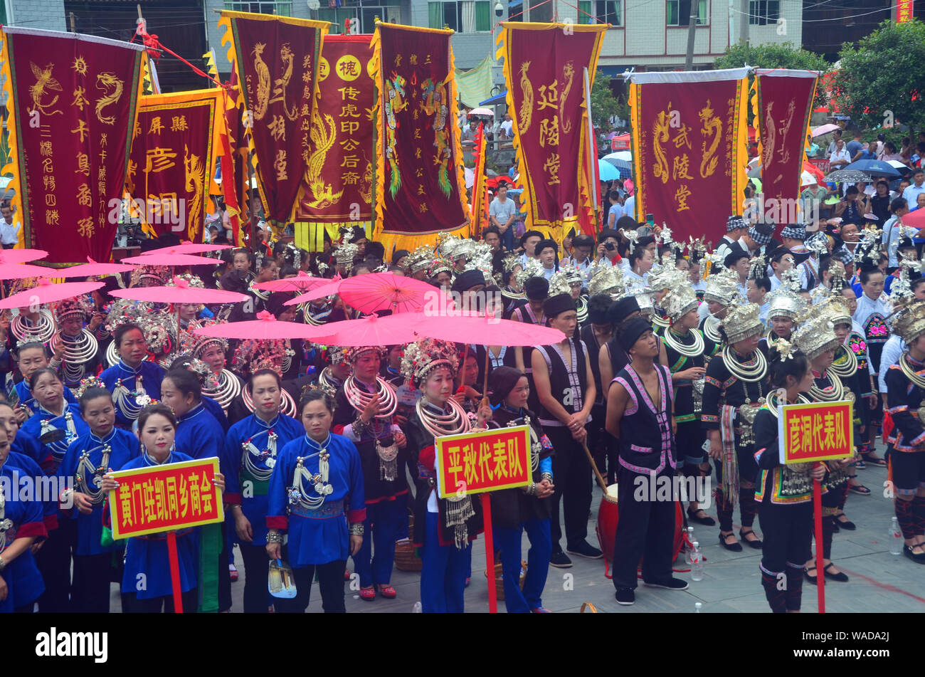 Chinese people of Dong ethnic group dressed in traditional costumes ...