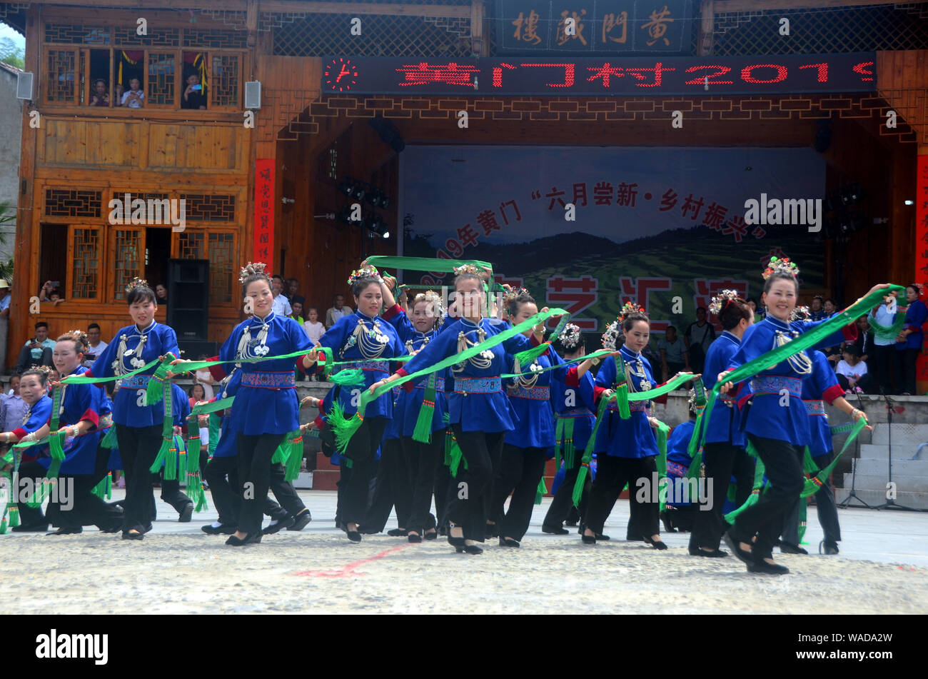 Chinese people of Dong ethnic group dressed in traditional costumes ...