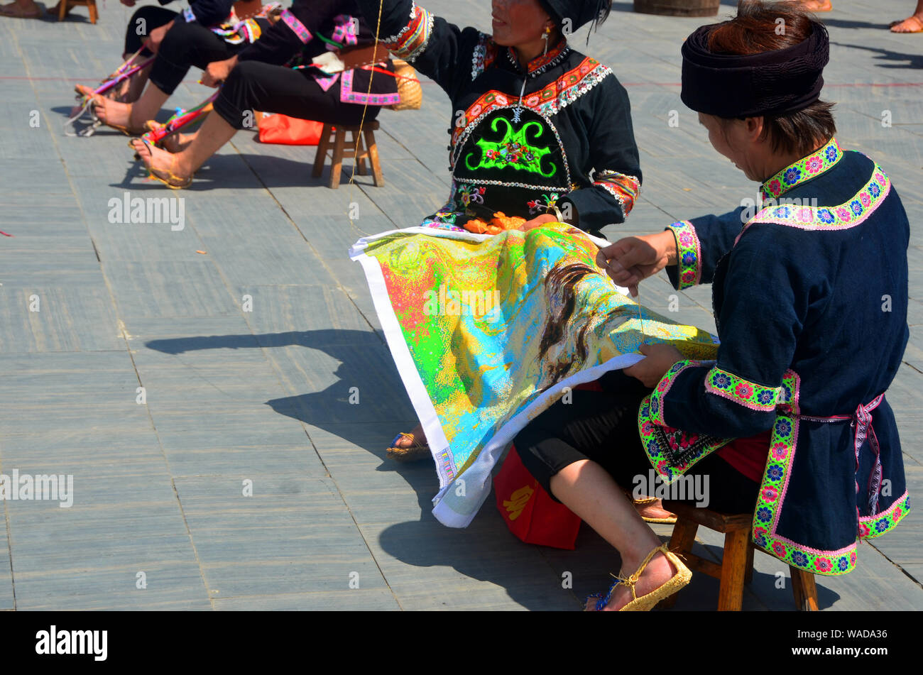 Chinese people of Dong ethnic group dressed in traditional costumes ...