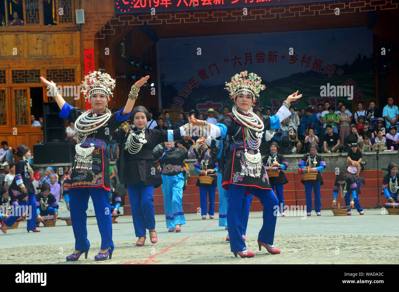 Chinese people of Dong ethnic group dressed in traditional costumes ...