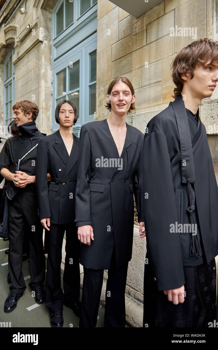 Models are pictured backstage after finishing hair and makeup at the ...