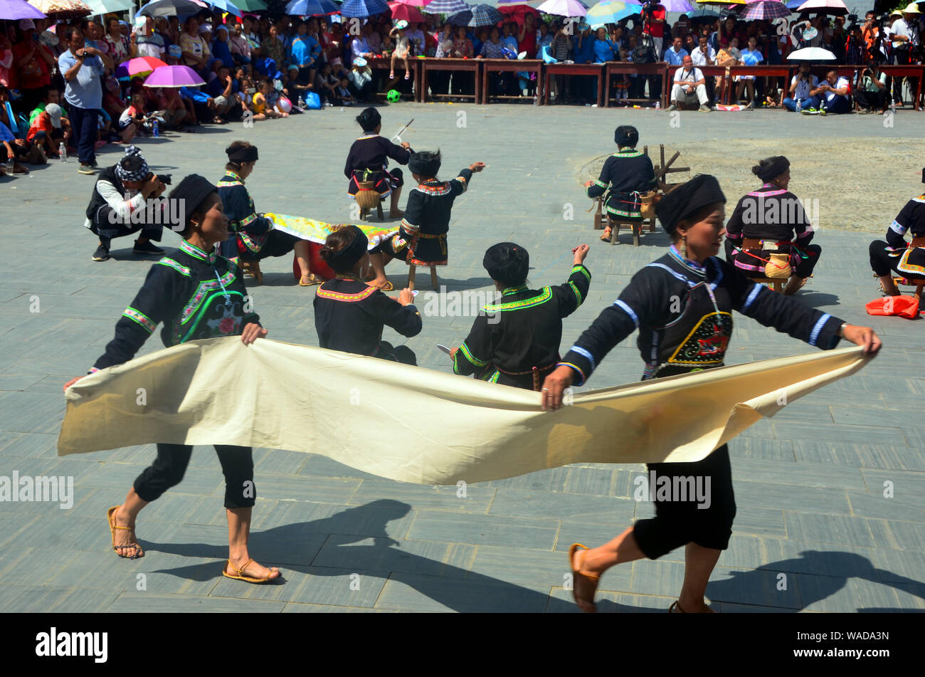 Chinese people of Dong ethnic group dressed in traditional costumes ...
