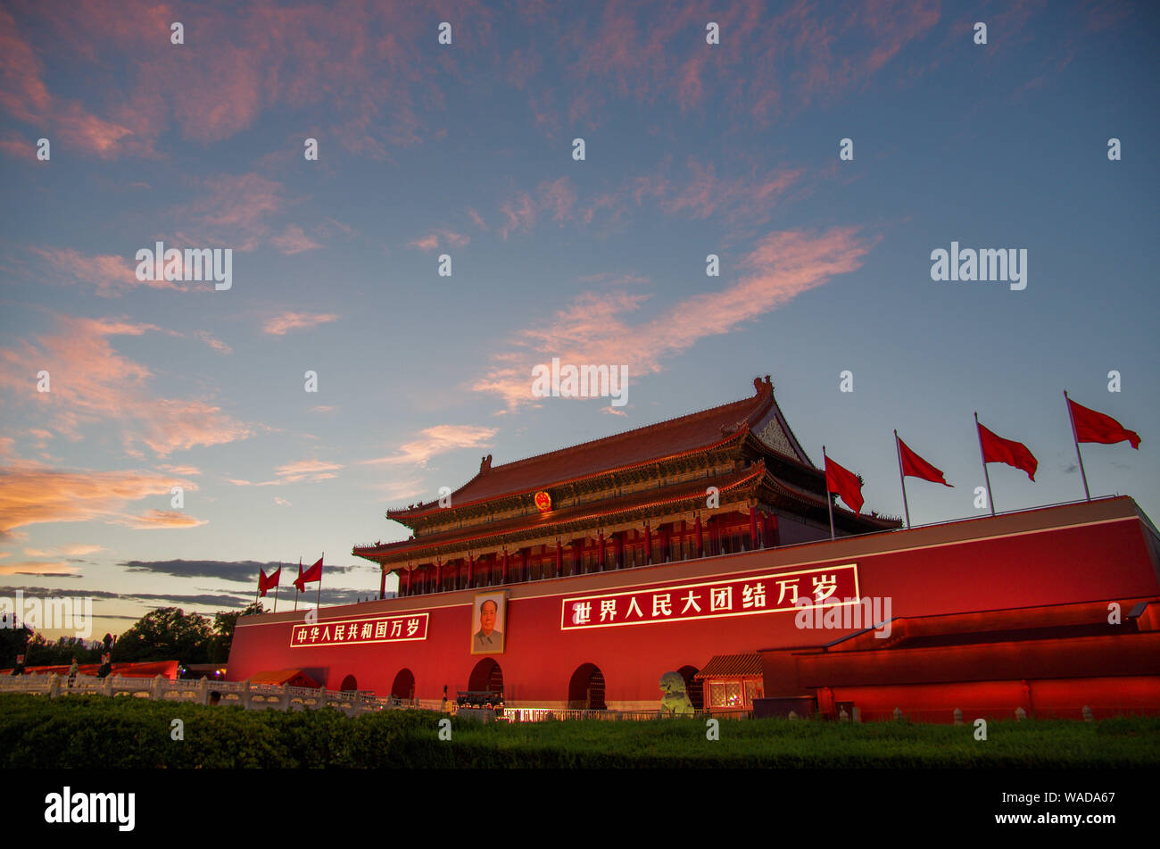 Tourists visit the Tian'anmen Rostrum at sunset in Beijing, China, 29 ...