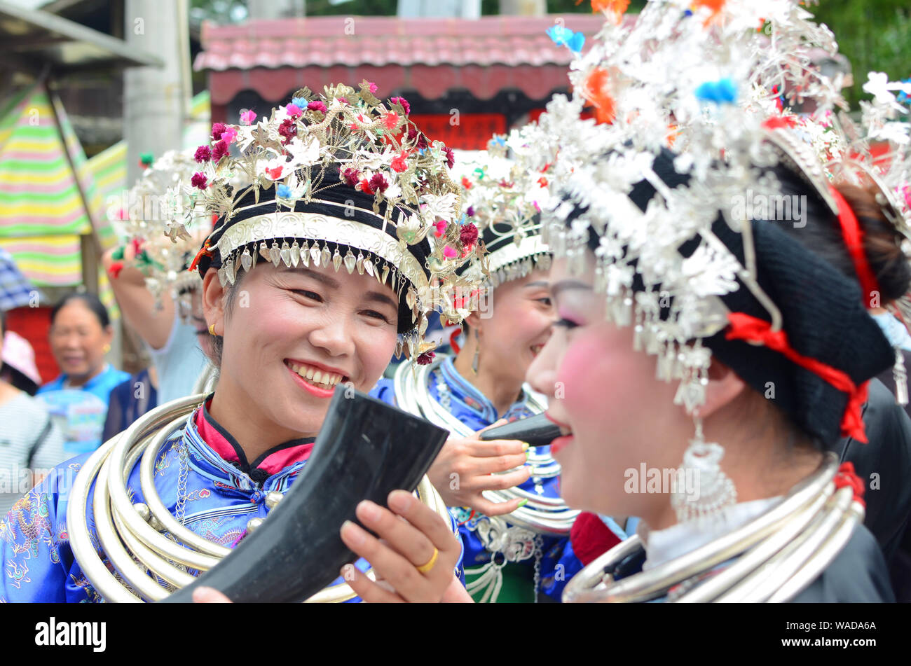 Chinese people of Dong ethnic group dressed in traditional costumes ...