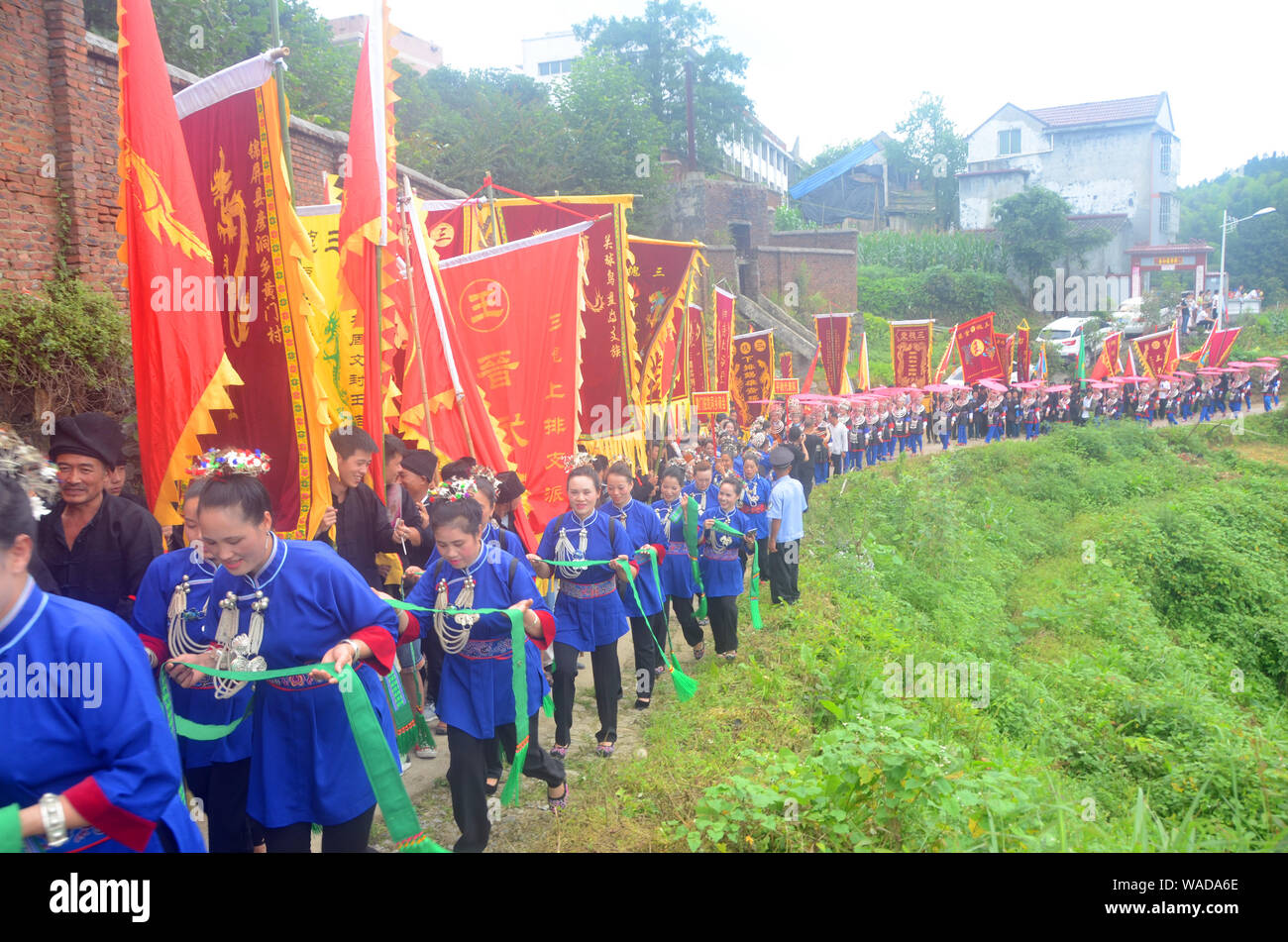 Chinese people of Dong ethnic group dressed in traditional costumes ...